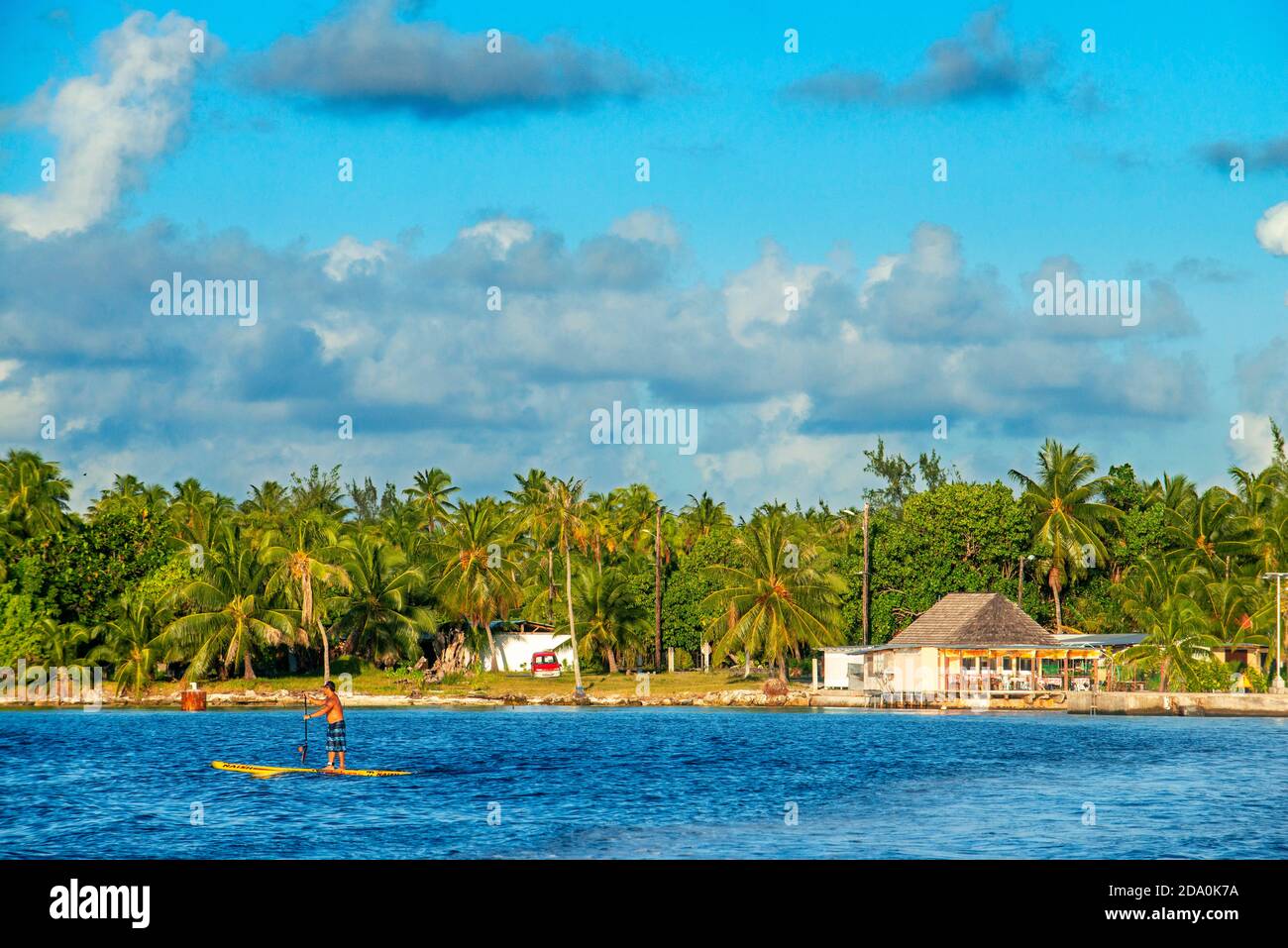 Paddle surf in the beach of Rangiroa, Tuamotu Islands, French Polynesia ...