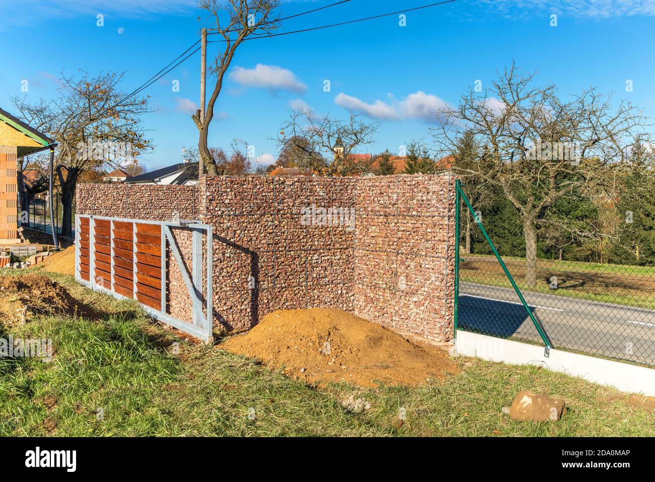 Strengthening a garden fence hi-res stock photography and images - Alamy