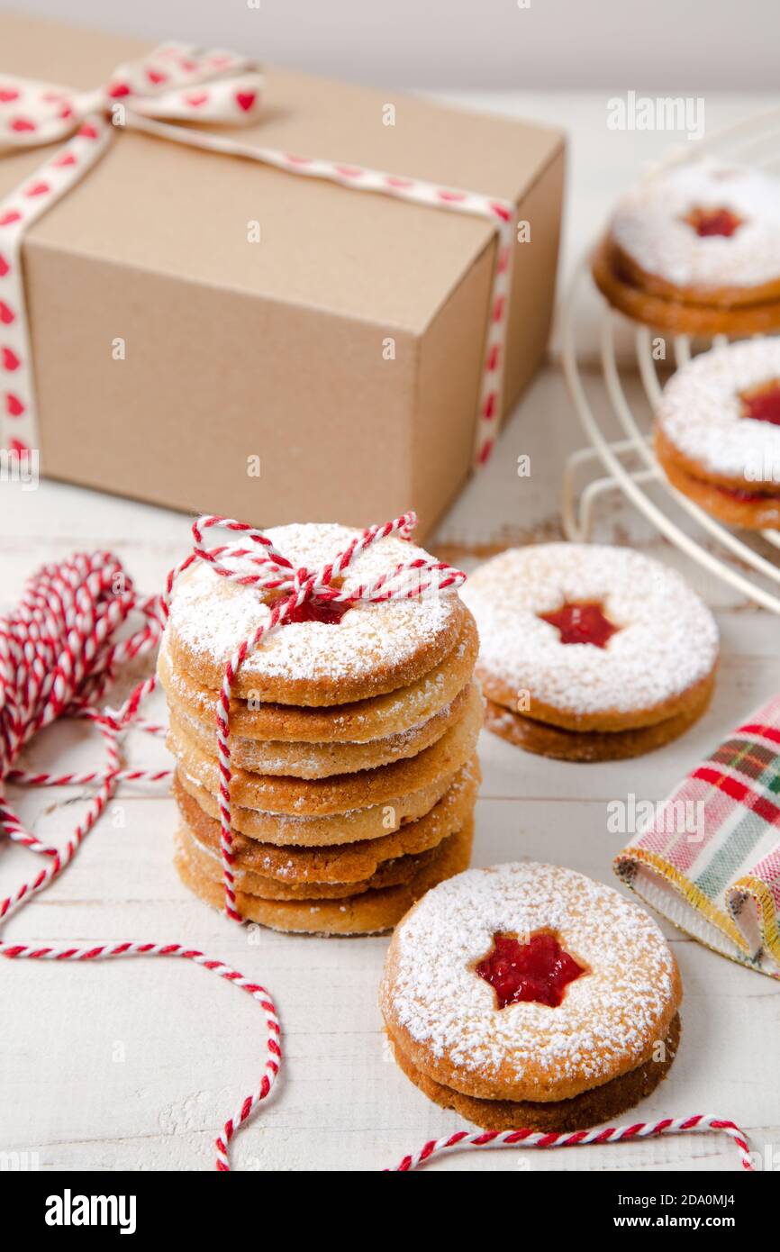 Traditional Linzer Christmas cookies made of almond and butter filled ...