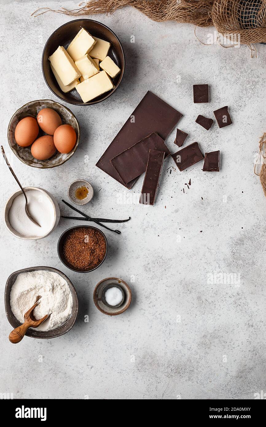 Top view set of various ingredients for traditional brownie cake recipe ...