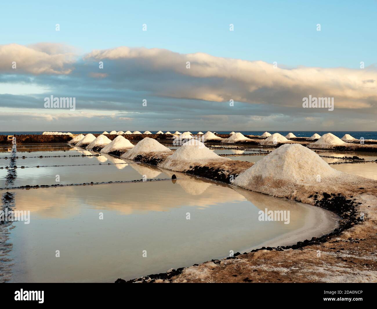 Amazing scenery of salt flats located near sea at sunset in La Palma in ...