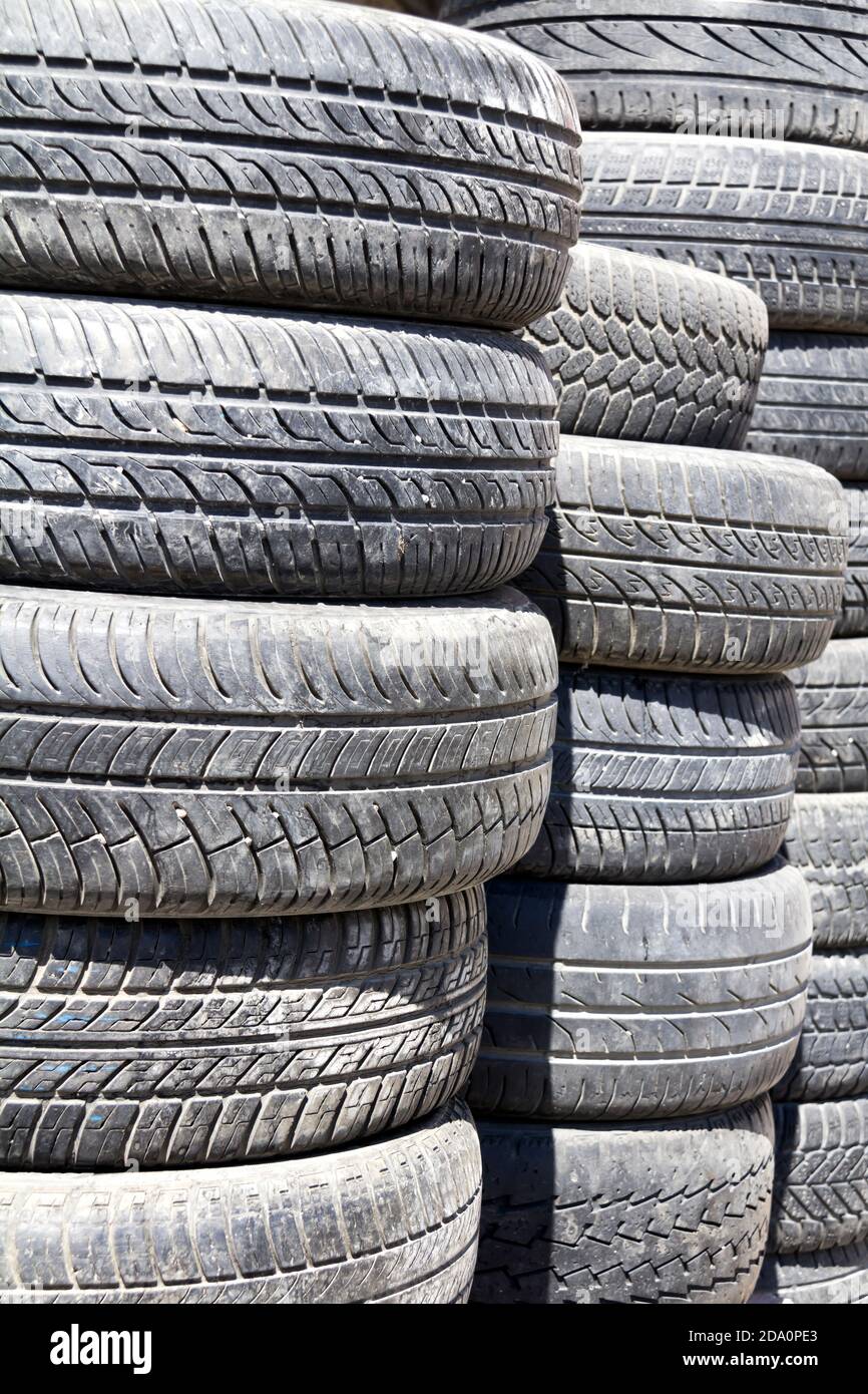 Pile of used rubber tyres Stock Photo - Alamy