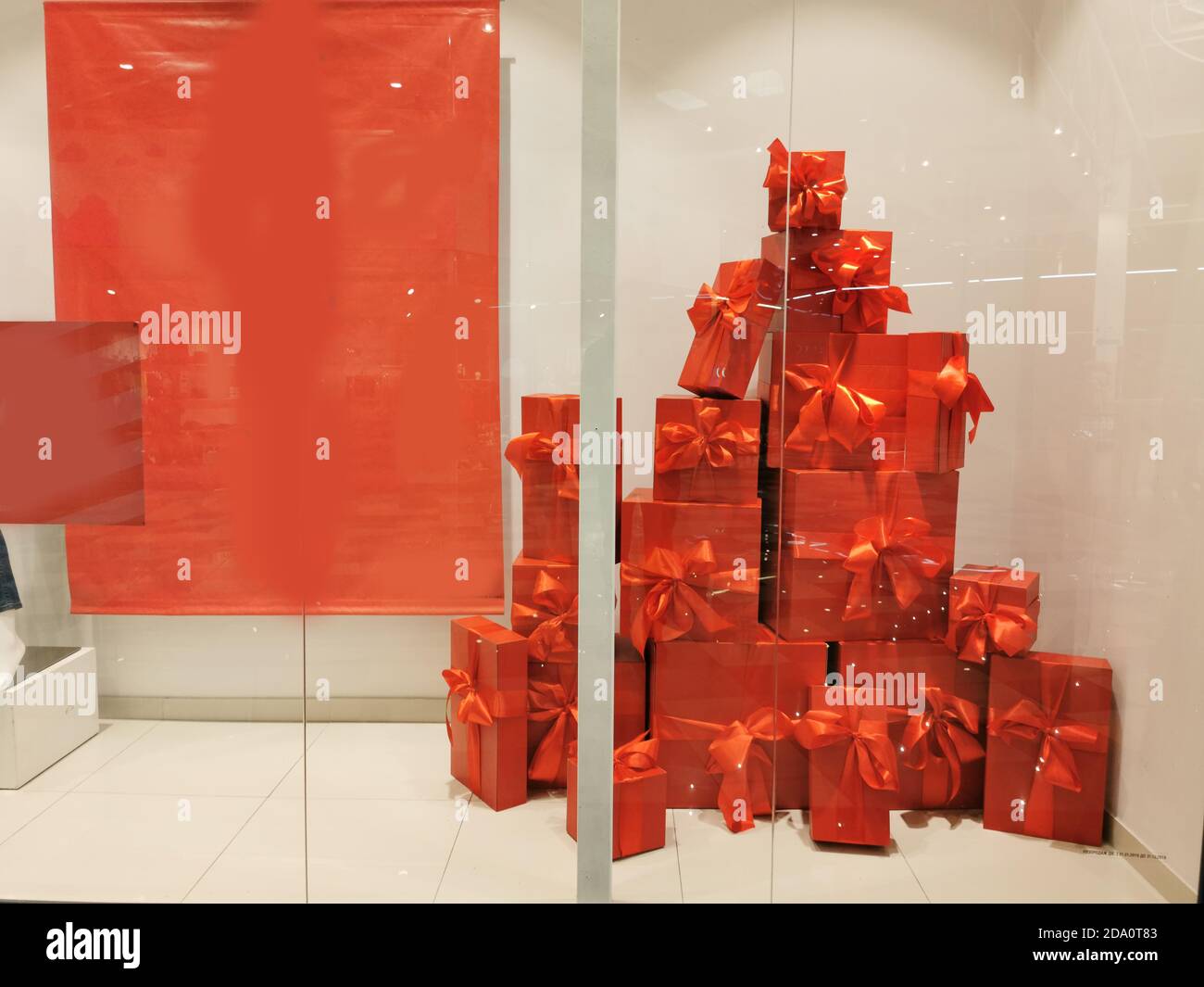 red and white sales promotion, gift box against a red background Stock ...