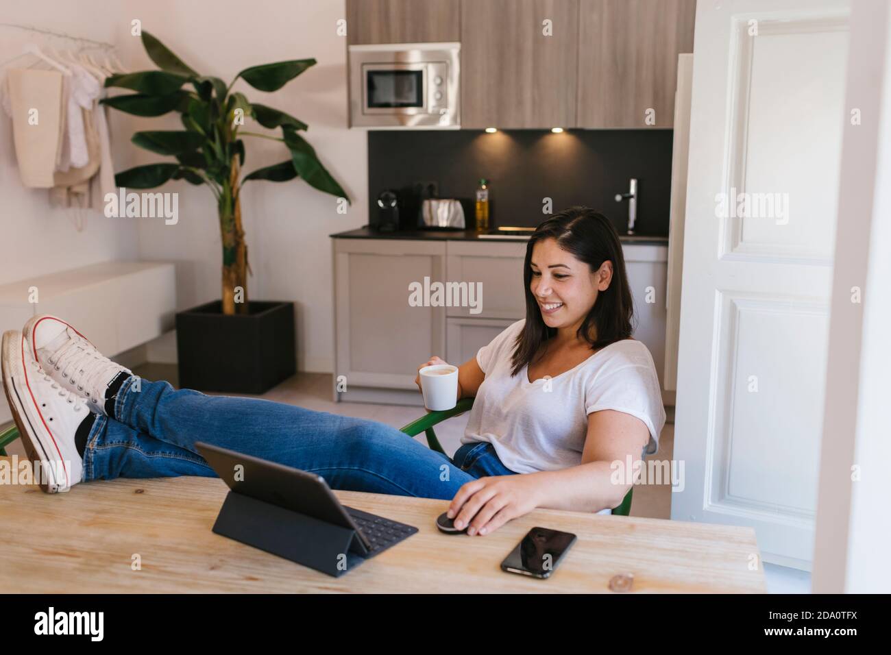 Working from cozy cafe hi-res stock photography and images - Alamy
