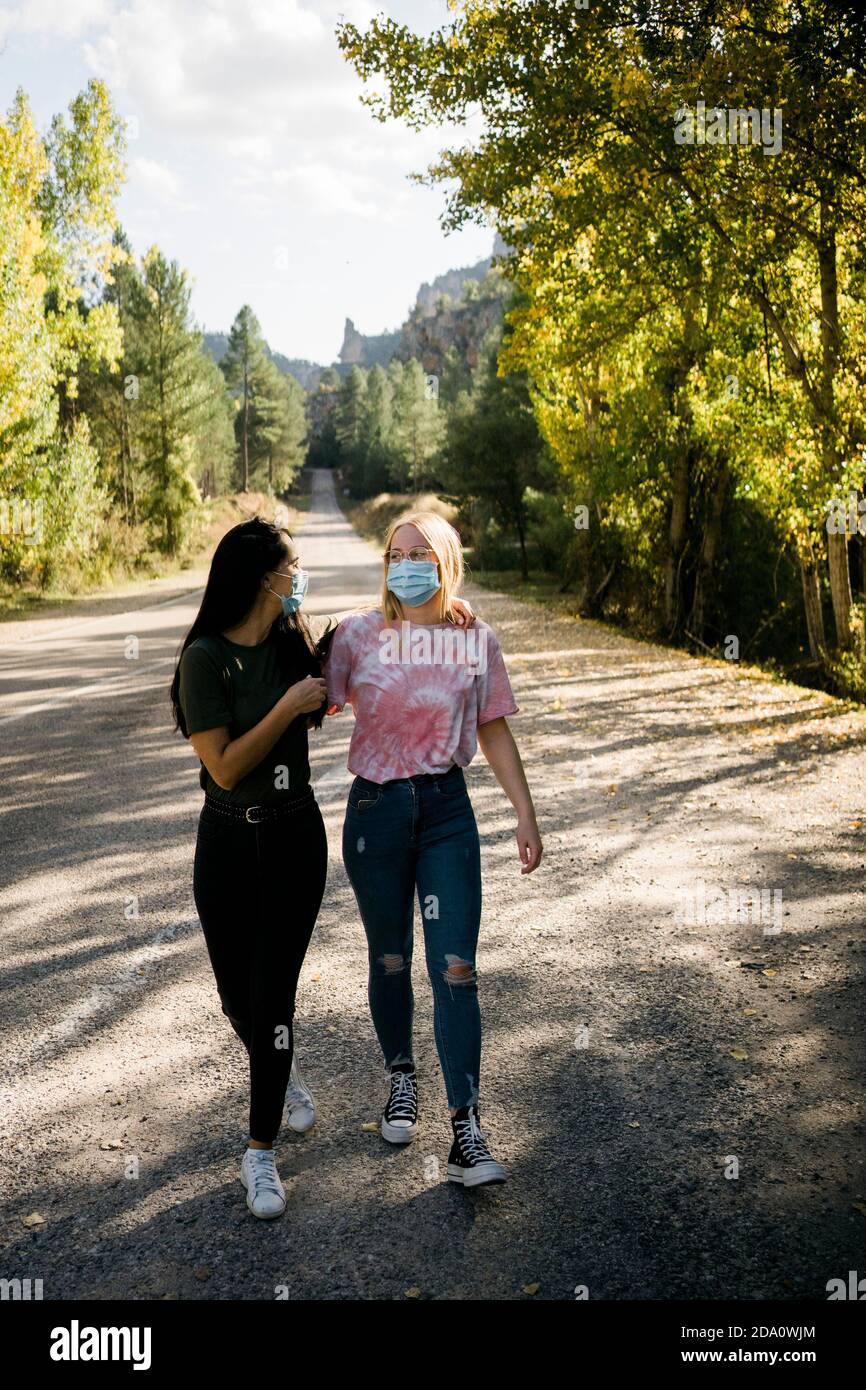 Women friends hug autumn hi-res stock photography and images - Alamy