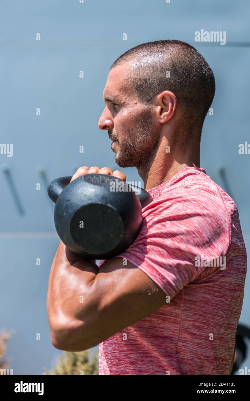 Handsome sportsman doing side hi-res stock photography and images - Alamy