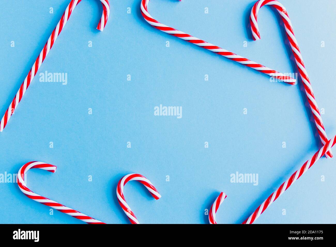 Christmas candy canes and fir branches flat lay Stock Photo - Alamy