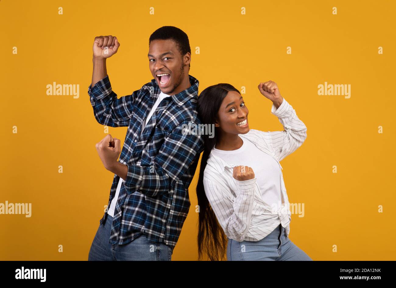 Express emotions of victory and celebrating win together Stock Photo ...