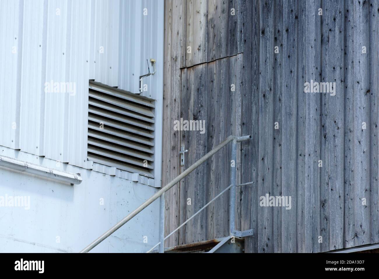 An old rusted silo photographed in a port area in summer Stock Photo ...