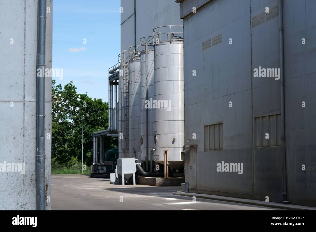 An old rusted silo photographed in a port area in summer Stock Photo ...