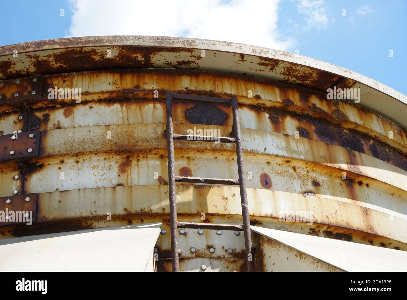 An old rusted silo photographed in a port area in summer Stock Photo ...