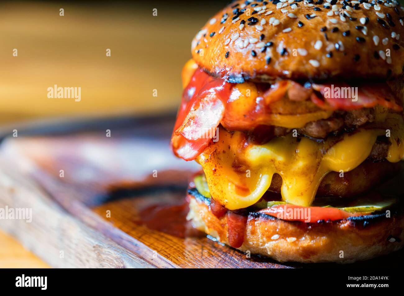 Close up tasty burger with minced meat served on tray Stock Photo - Alamy