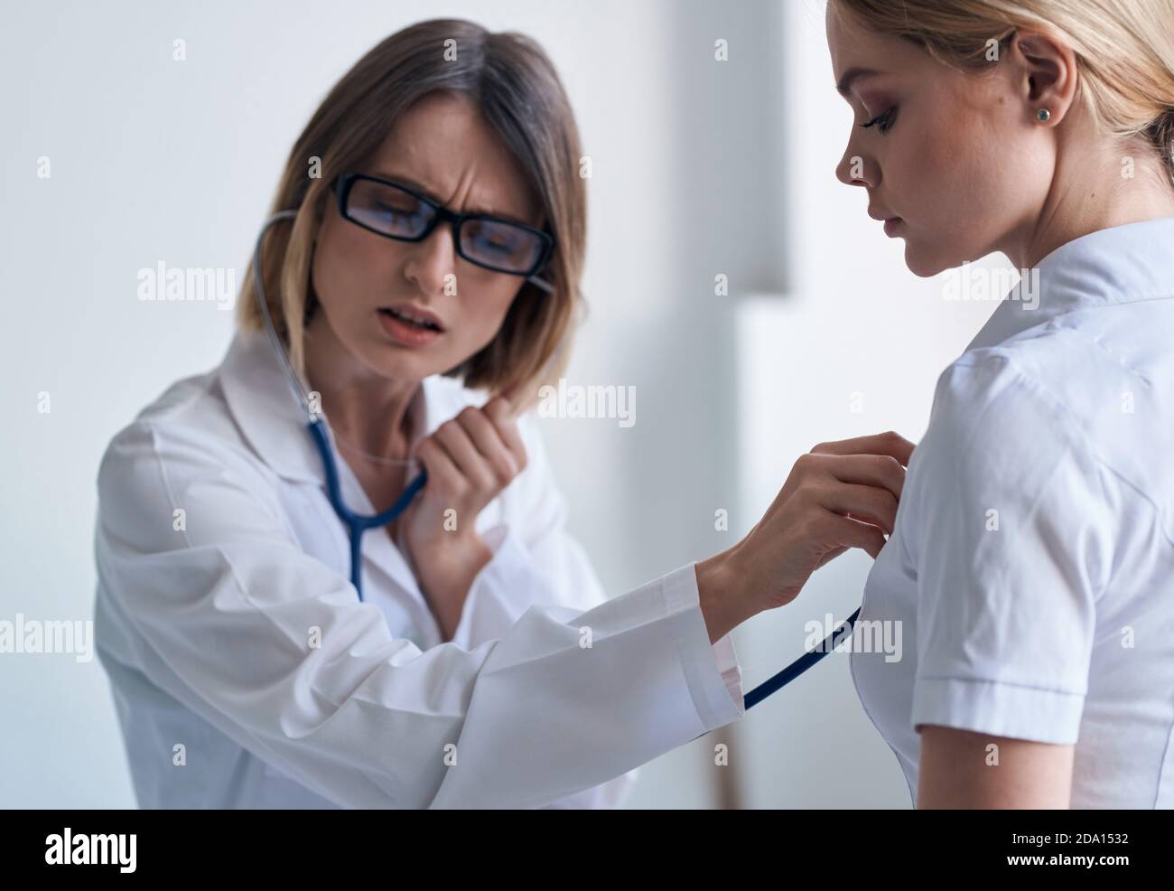 Doctor and patient on light blue background stethoscope health problems ...