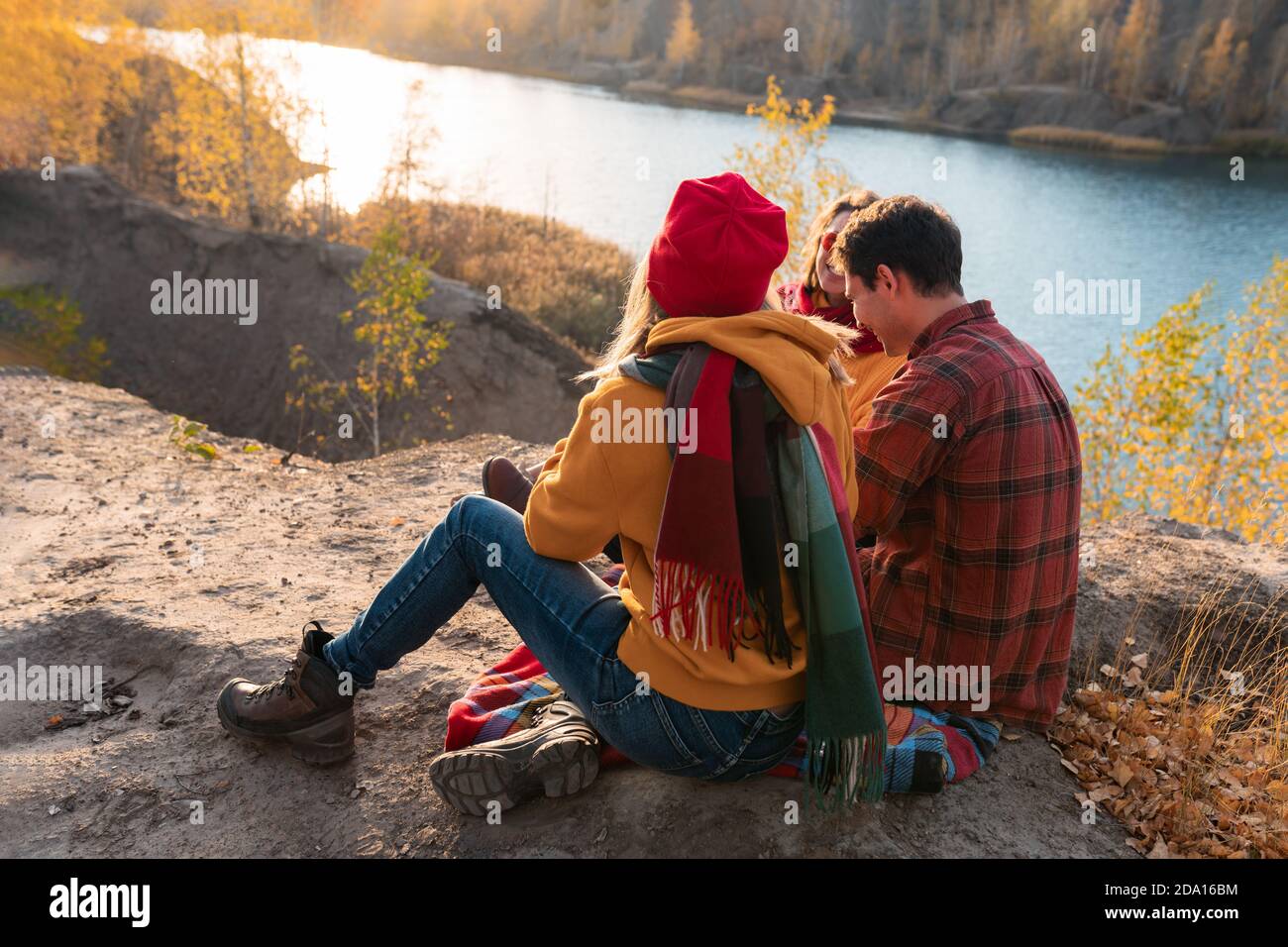 The group of young people are resting in nature Stock Photo - Alamy