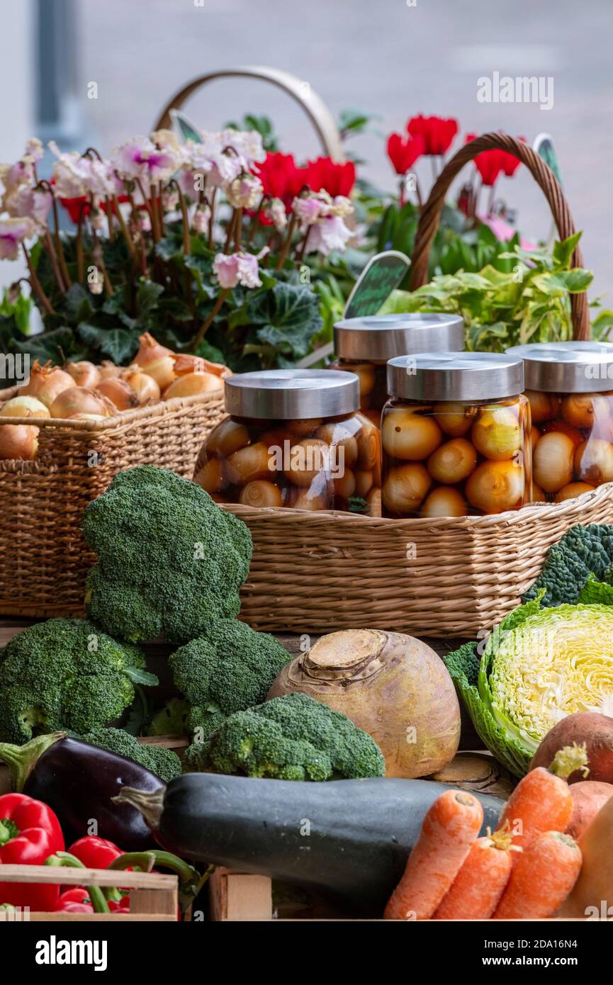 a selection of fresh fruit and vegetables and fresh produce on display ...