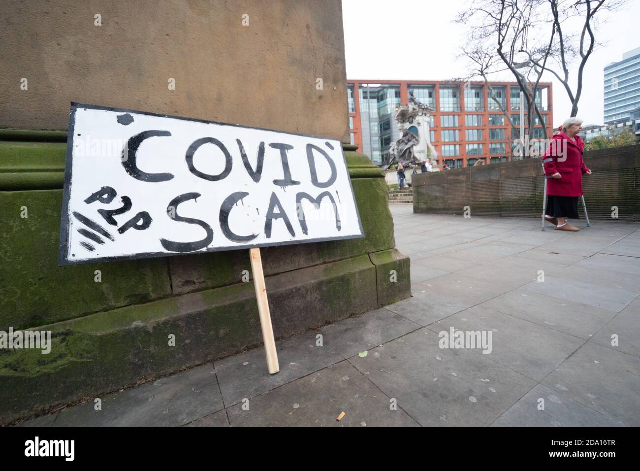 Manchester 08-11-2020 Piccadilly Gardens - a Covid Scam sign or placard ...