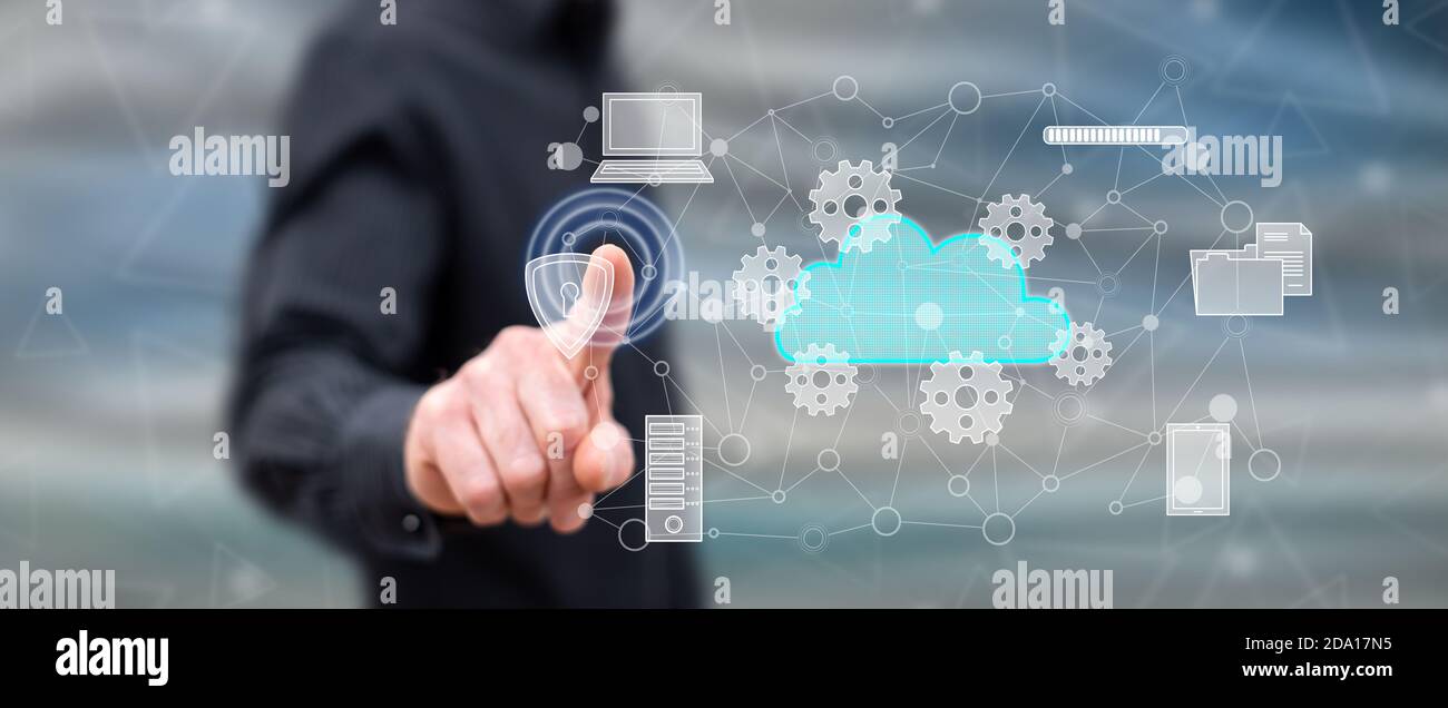 Man touching a cloud computing concept on a touch screen with his ...