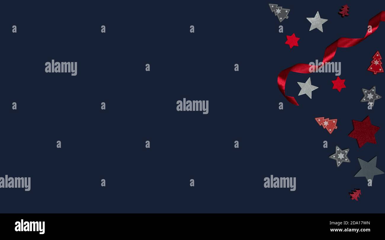 Christmas dark blue background, red ribbon spiral, red and grey ...