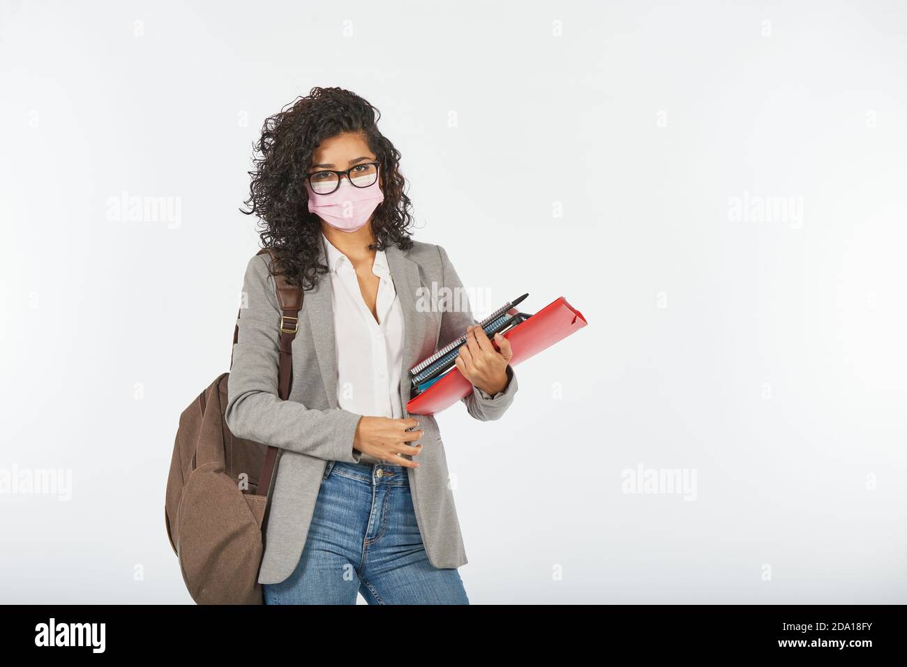University student ready to study with a mask due to the covid-19 ...