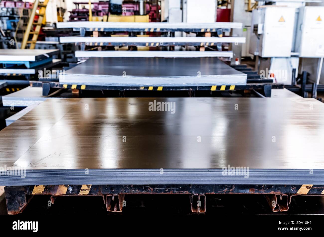 Pile of iron plate on the modern tractor factory Stock Photo - Alamy