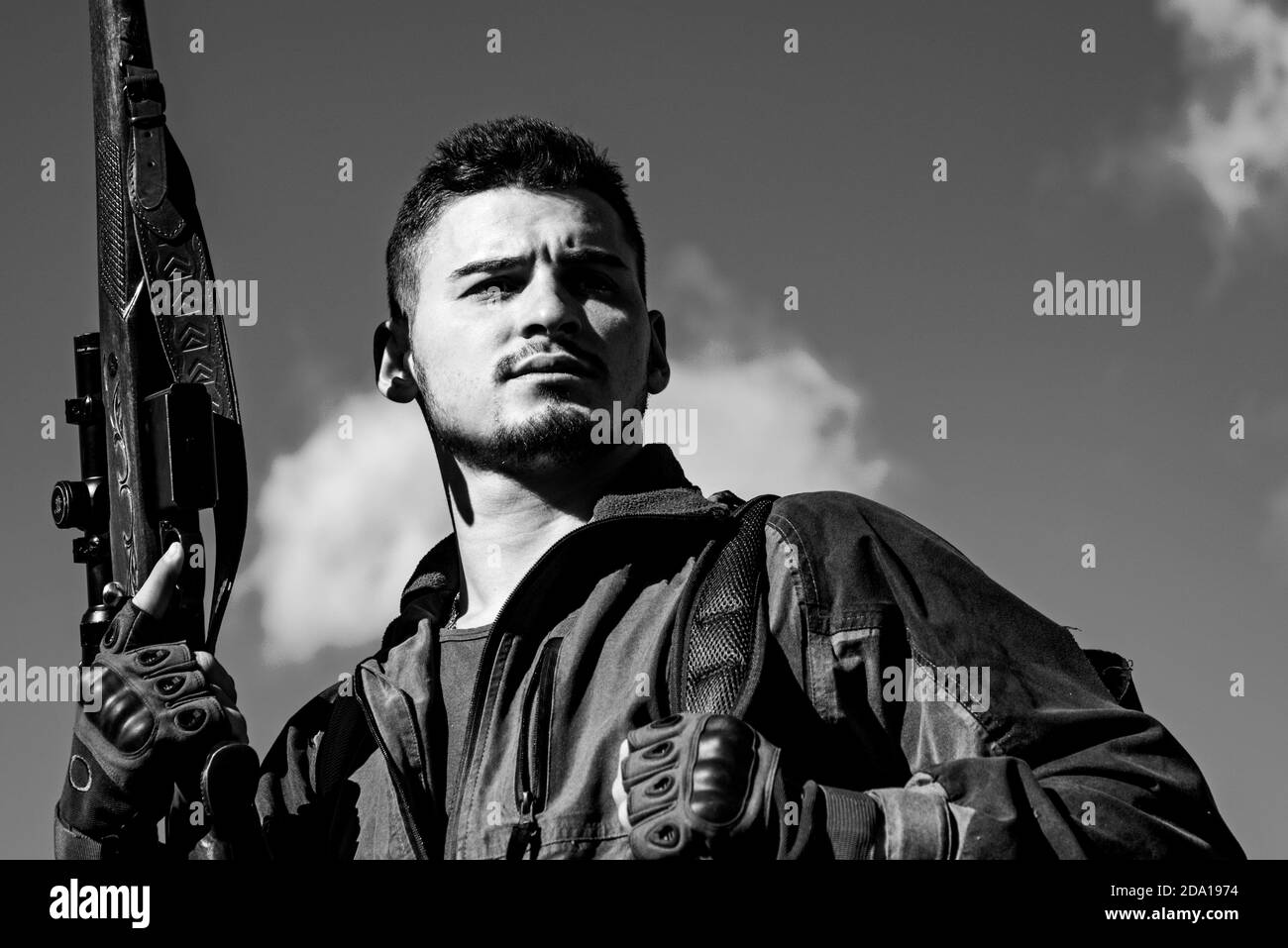 Man holding shotgun. Hunter man. Hunting period, autumn season. Hunter ...