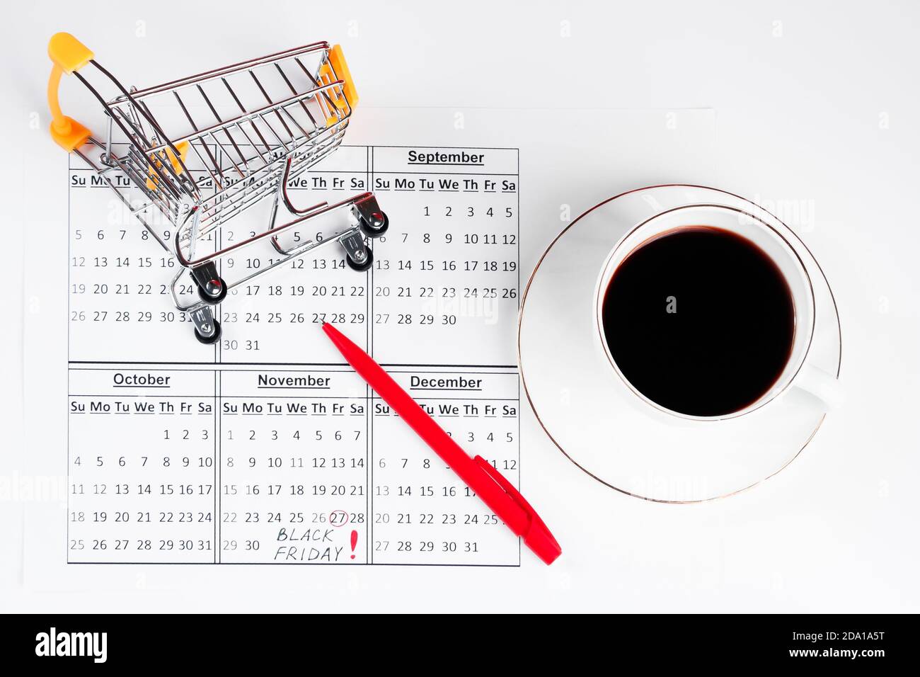 Black Friday concept. Shopping cart and calendar reminder Stock Photo ...