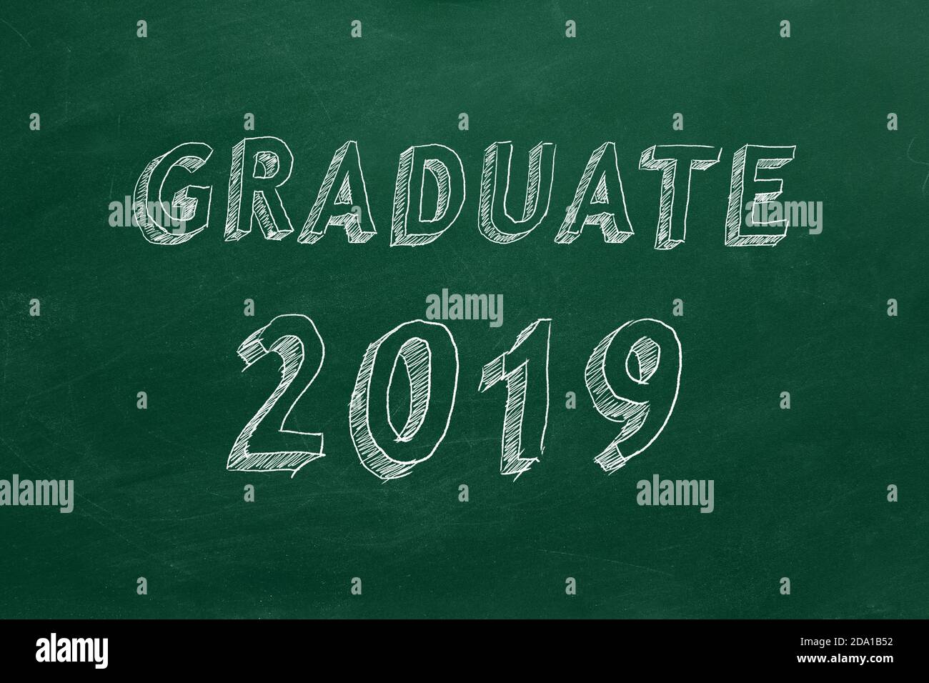 Hand drawing "Graduate 2019" on green chalkboard Stock Photo - Alamy