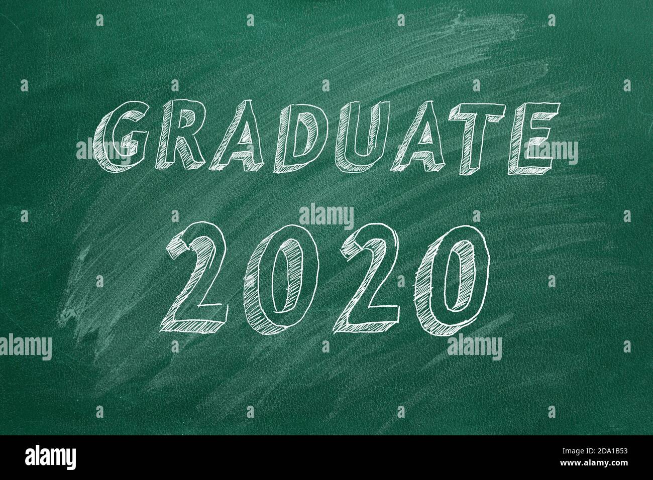 Hand drawing "Graduate 2020" on green chalkboard Stock Photo - Alamy