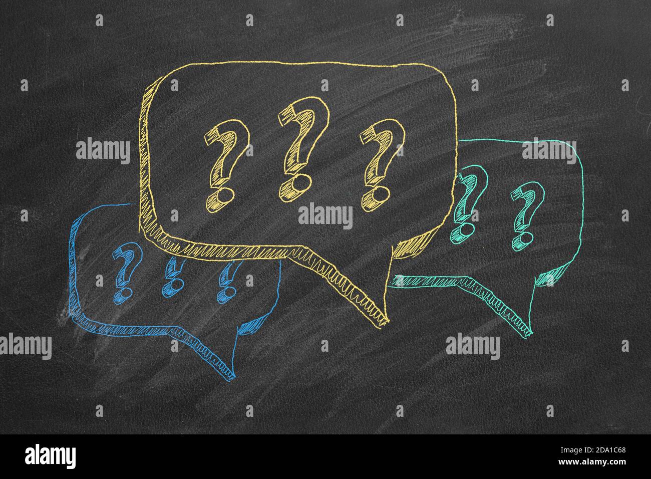 Hand drawing question marks on blackboard Stock Photo - Alamy
