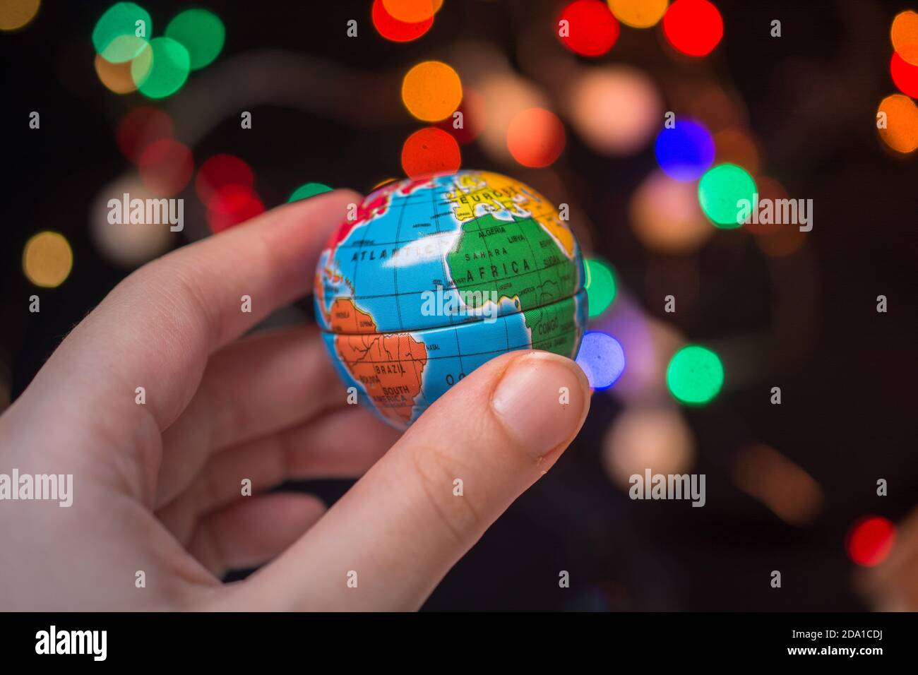 World globe model in hand. Global business and ecology concept Stock ...