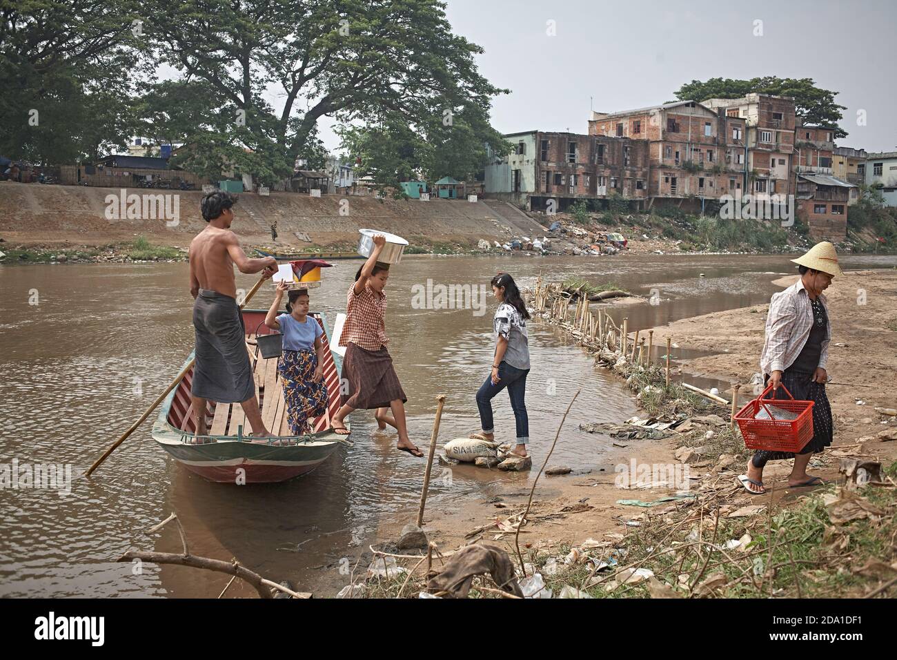 Mae Sot, Thailand. April 2012. Passenger boat crossing the river that ...