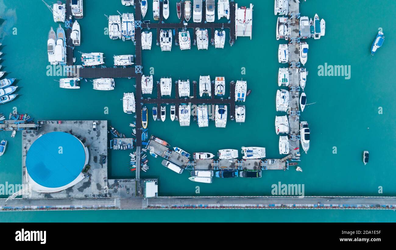 Aerial View Top down Drone shot of Yacht and sailboat parking in marina ...