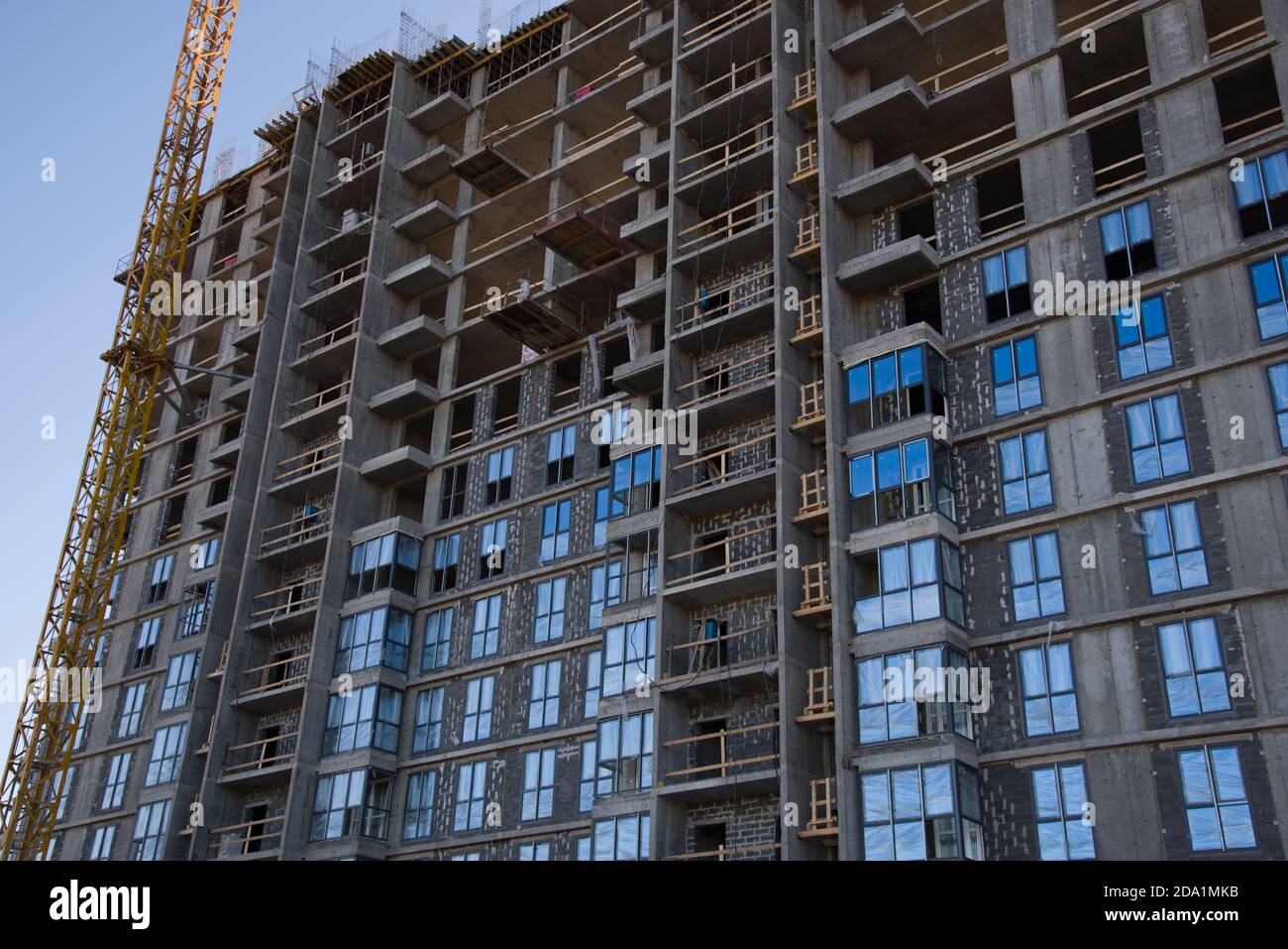 Installation of double-glazed windows in a multi-storey building at a ...