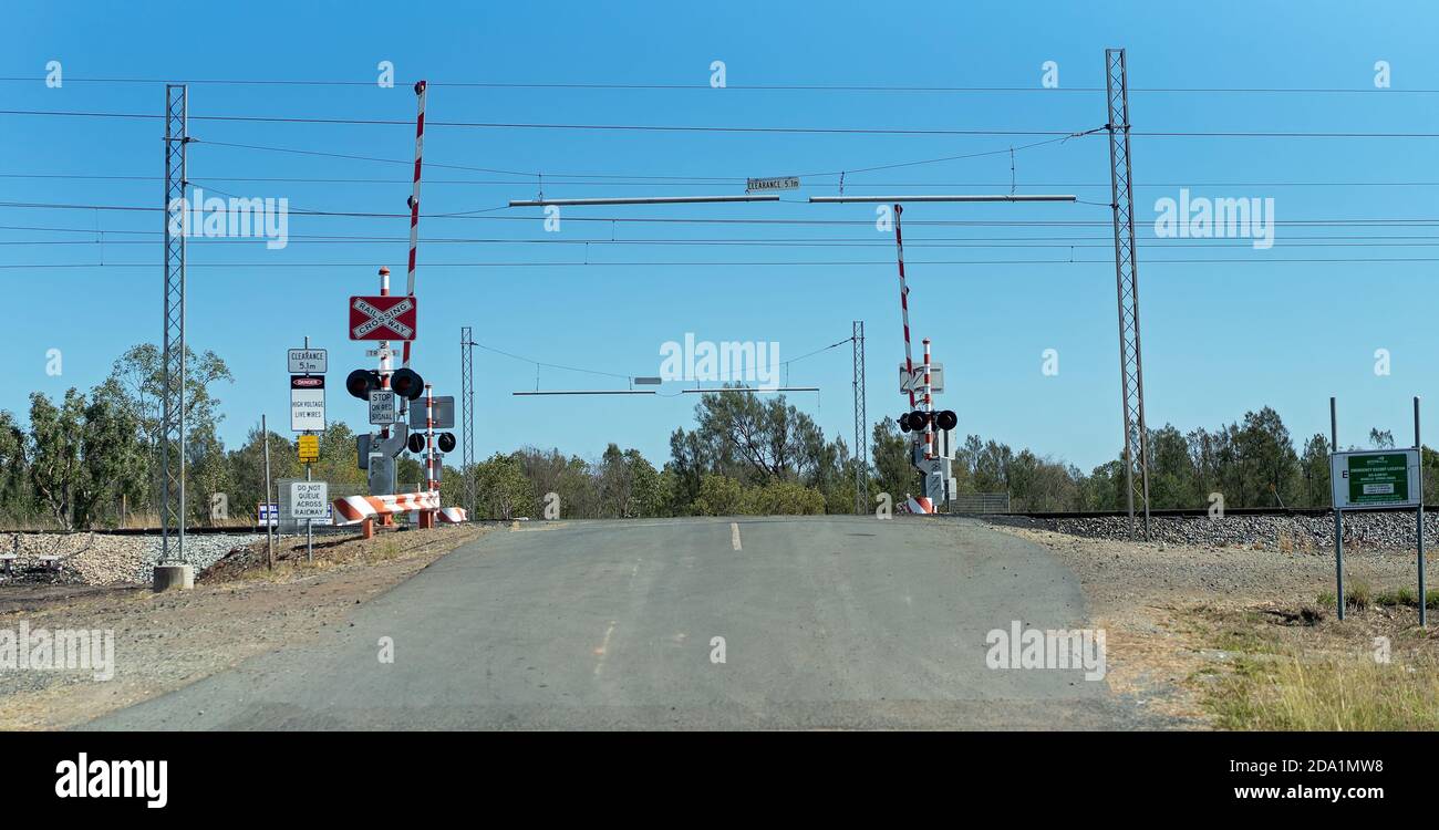 Nebo, Queensland, Australia - October 2019: Railway crossing with high ...