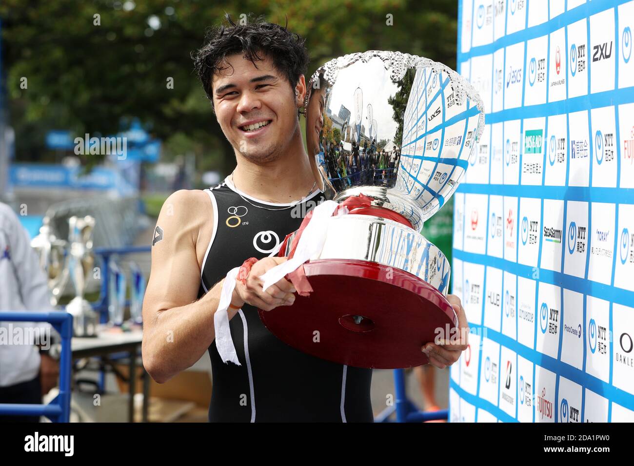 Winner Kenji Nener poses with the trophy during the 26th Japan ...
