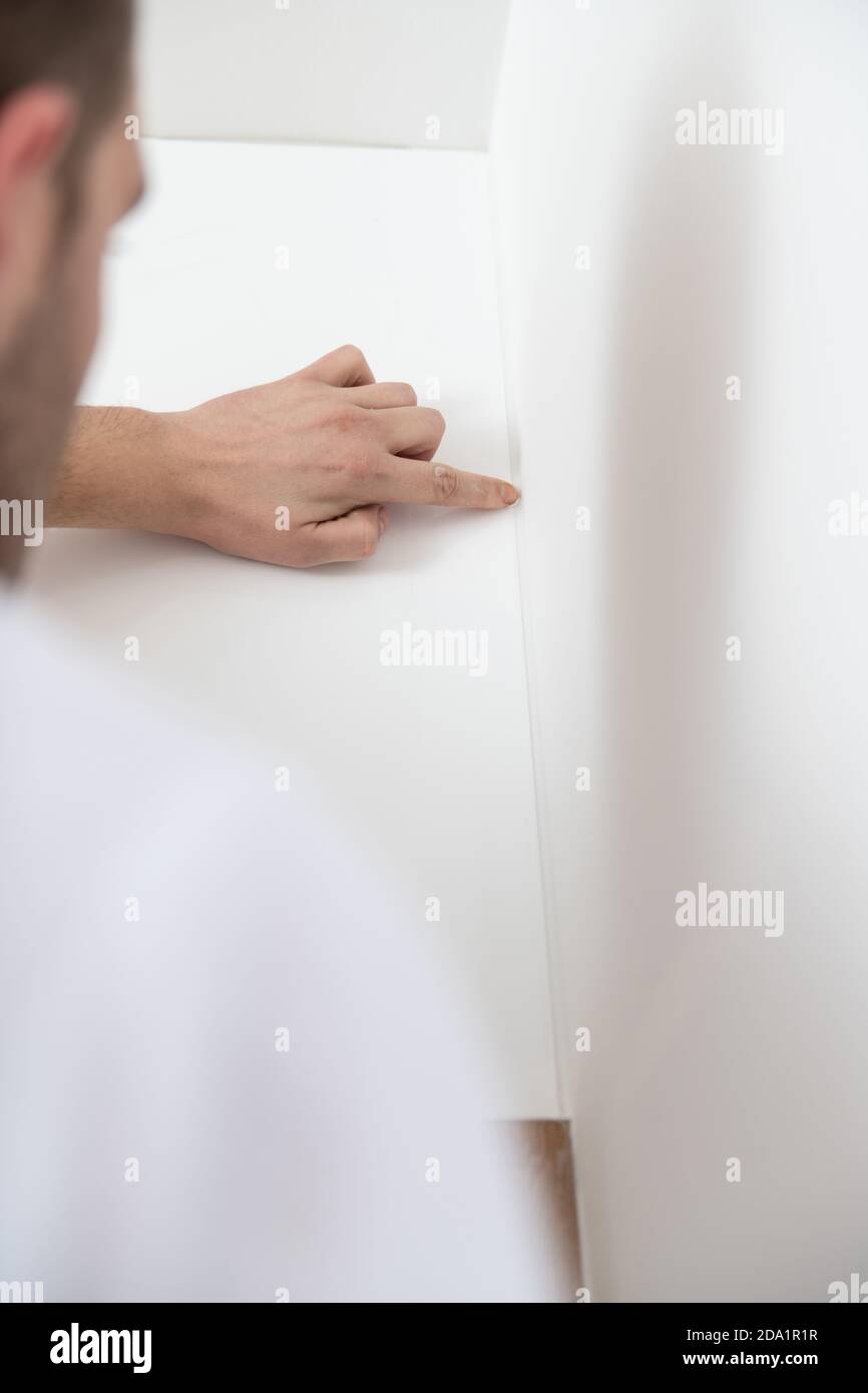 Construction Worker Use Finger Applying Silicone for Repairing and ...