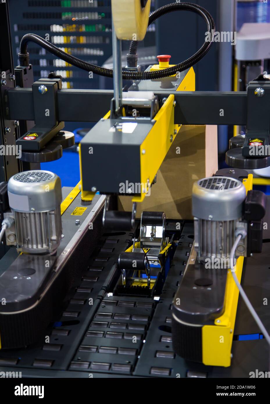 Semi automatic cardboard box tape sealing machine Stock Photo - Alamy