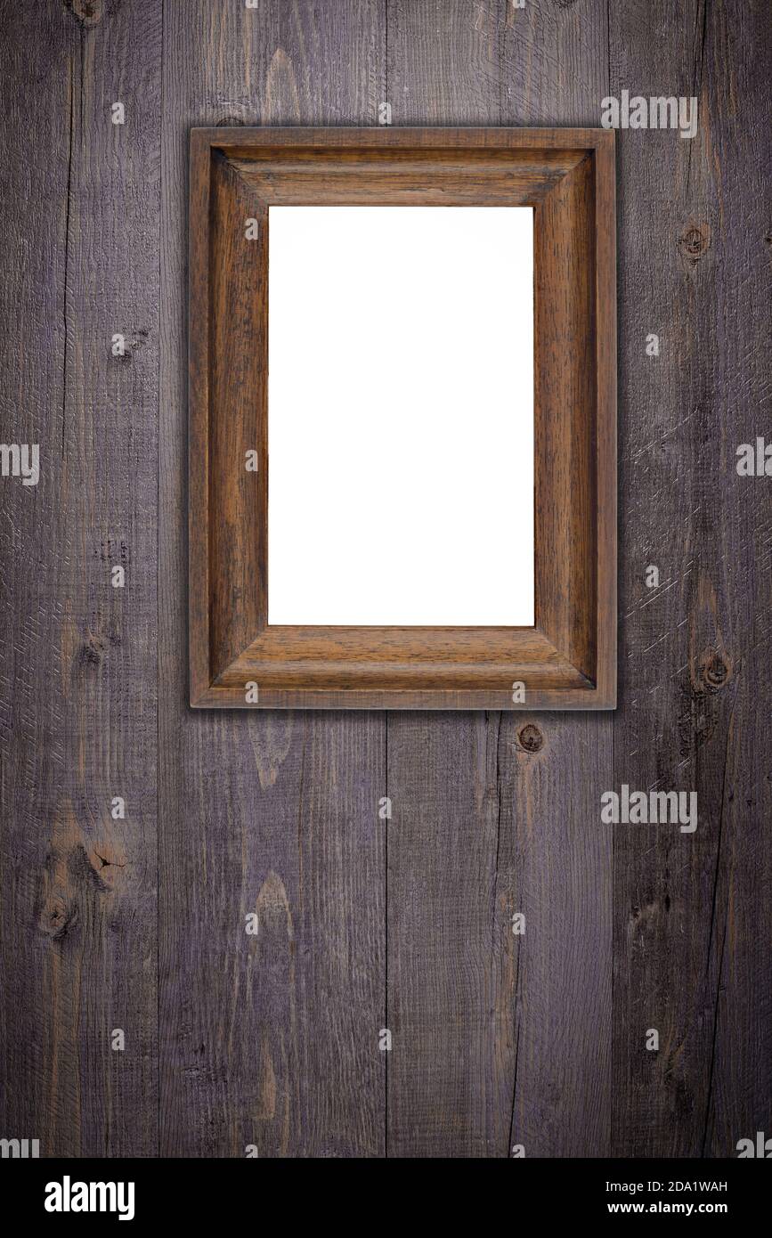 Old picture frame on vintage wood wall Stock Photo - Alamy