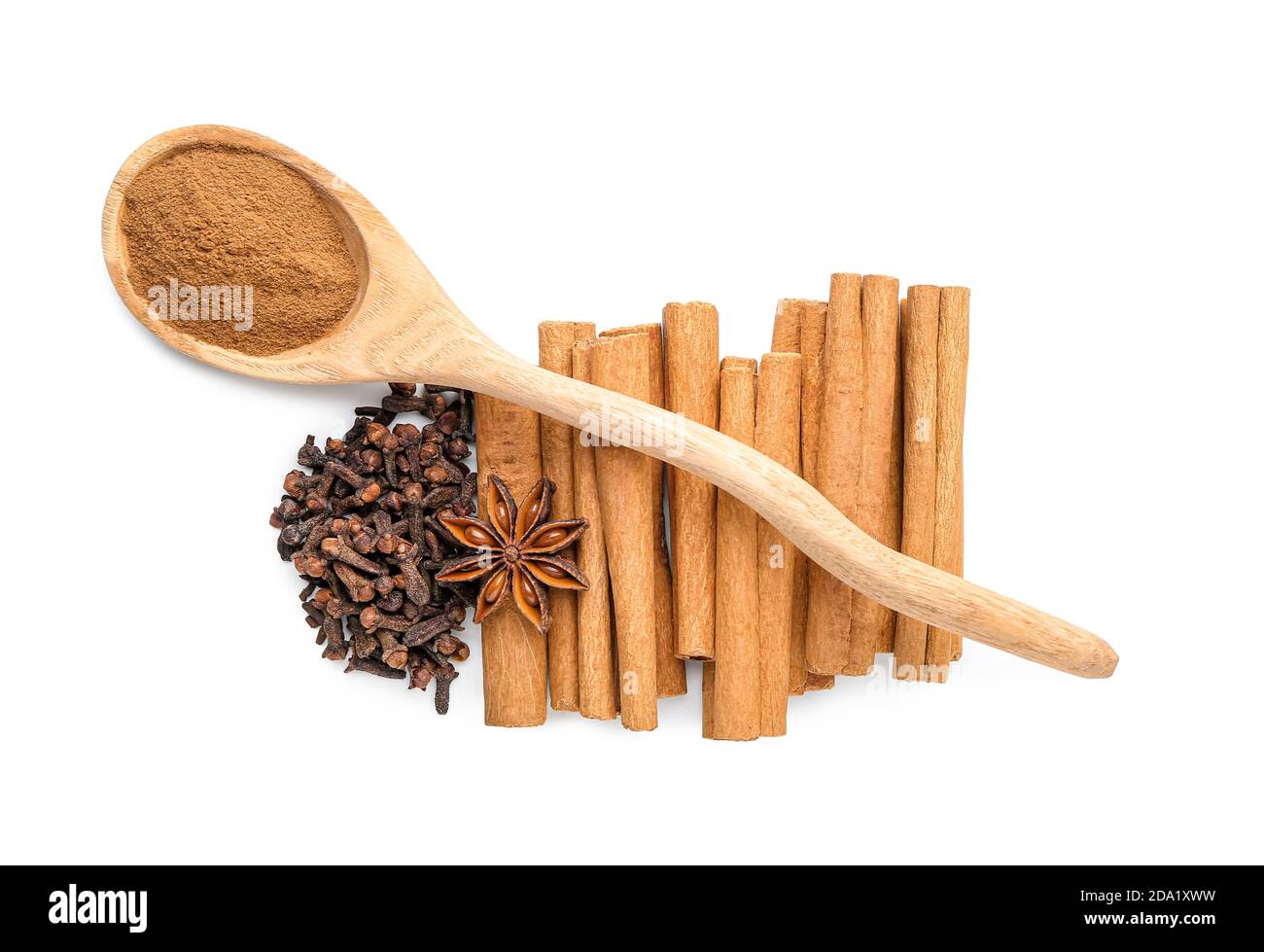 Composition with cinnamon and cloves on white background Stock Photo ...