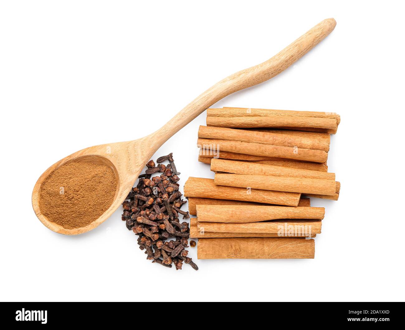 Composition with cinnamon and cloves on white background Stock Photo ...