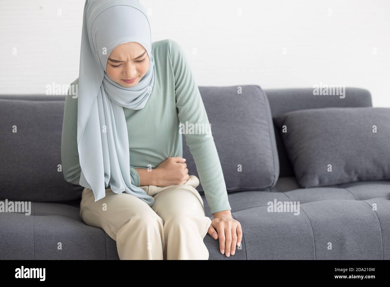 Muslim Woman Feeling Sick Stock Photo - Alamy