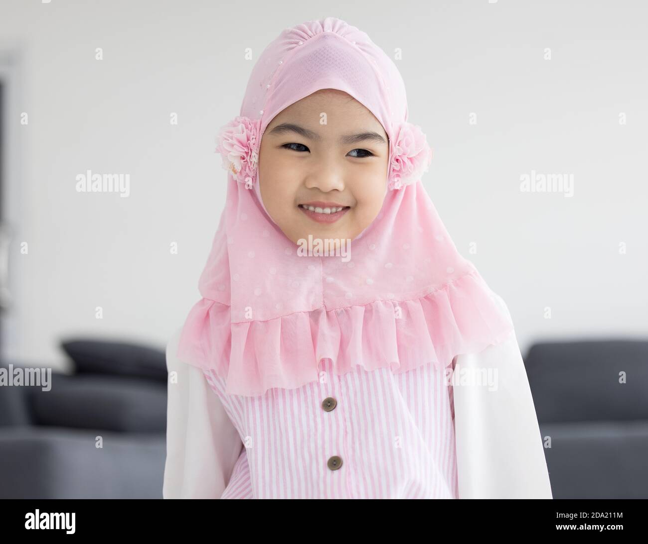 Portrait of happy little muslim girls child with hijab dress smi Stock ...