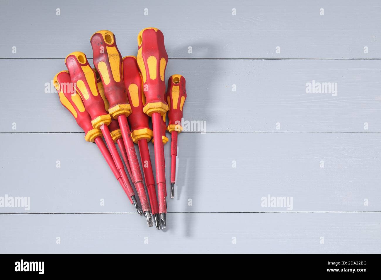 A set of a lot of different red tools for working include hammer ...