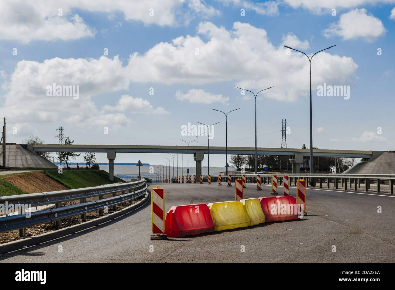 Red and white road sign. Road guide barriers line up on the road Stock ...