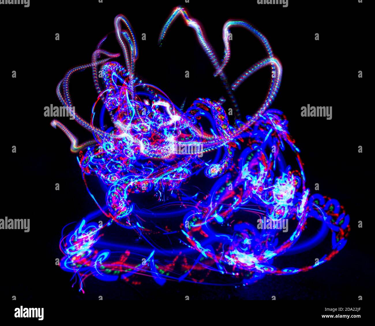 Light painting. Creative shapes created by different light sources ...