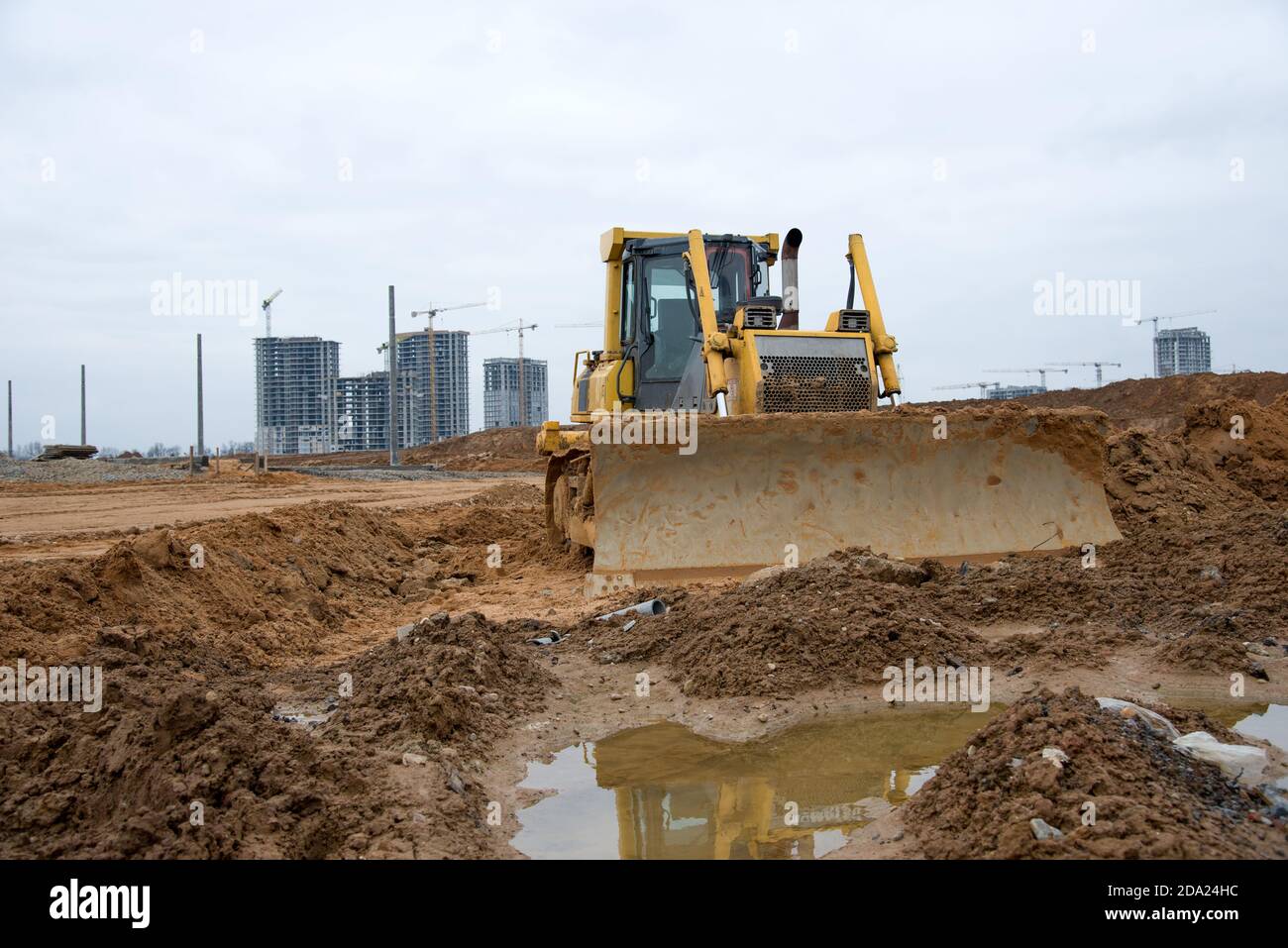 Dozer with bucket for pool excavation and utility trenching. Bulldozer ...