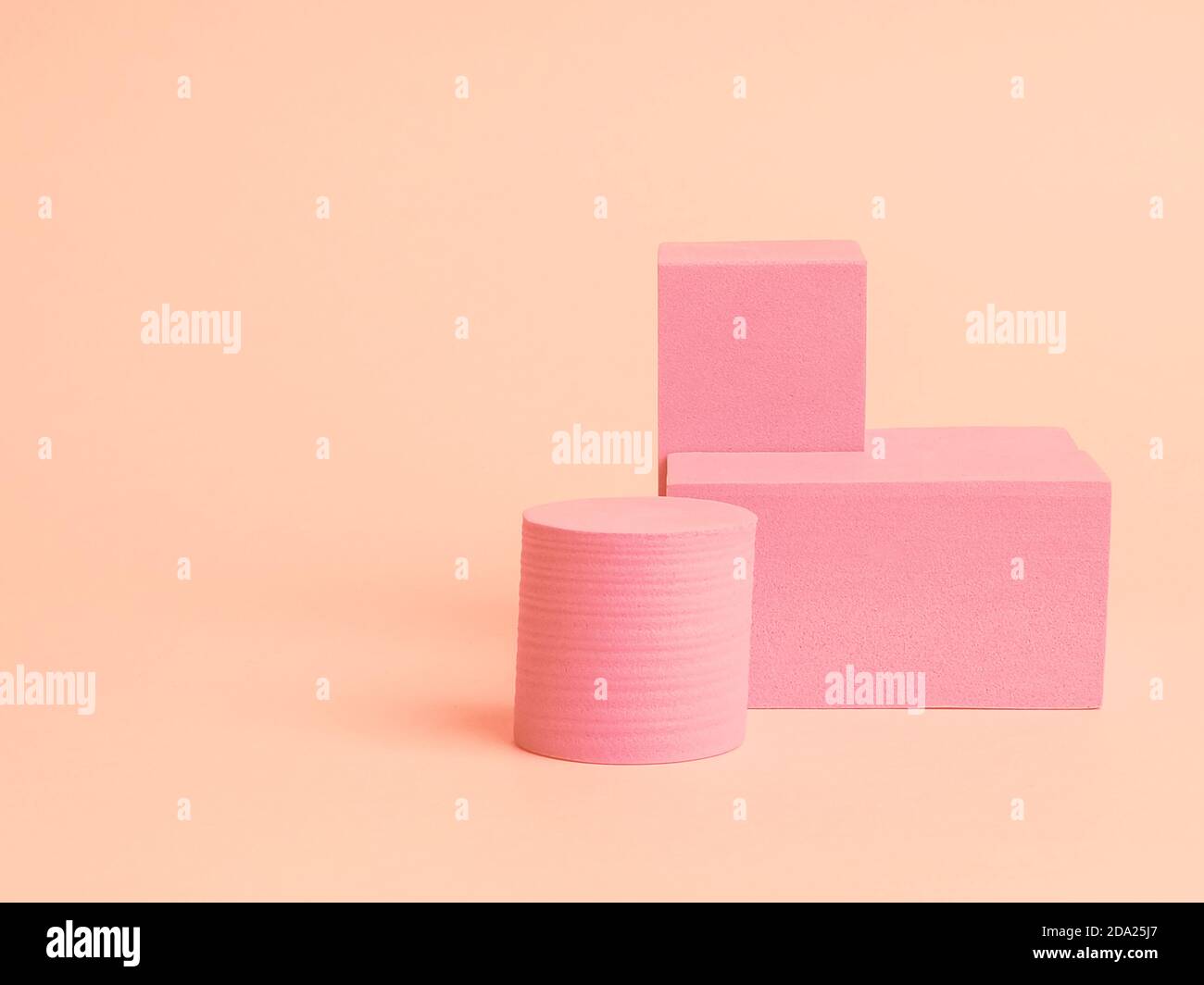 Stack of pink blocks. Geometrical figures still life composition ...