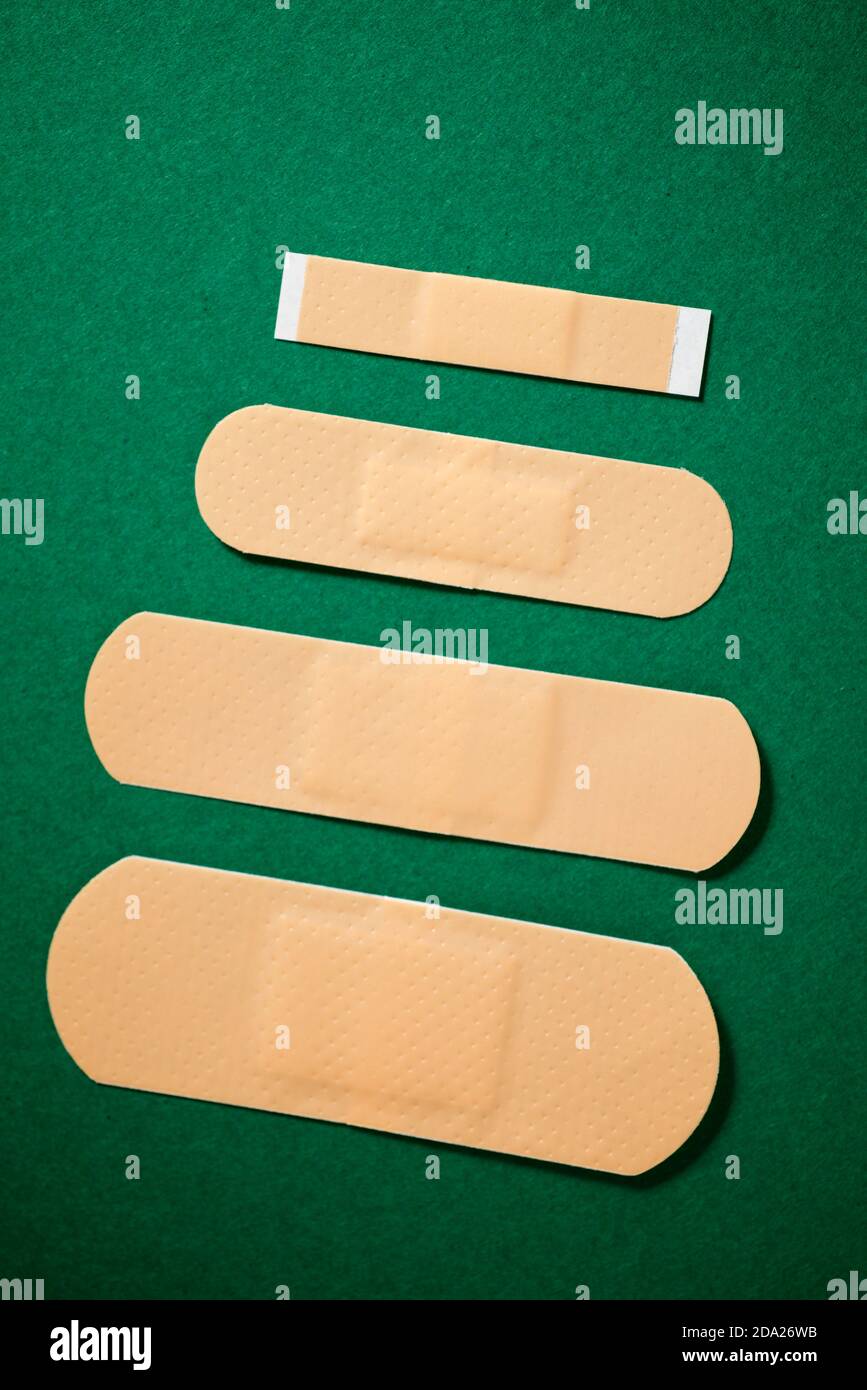 Green plasters hi-res stock photography and images - Alamy