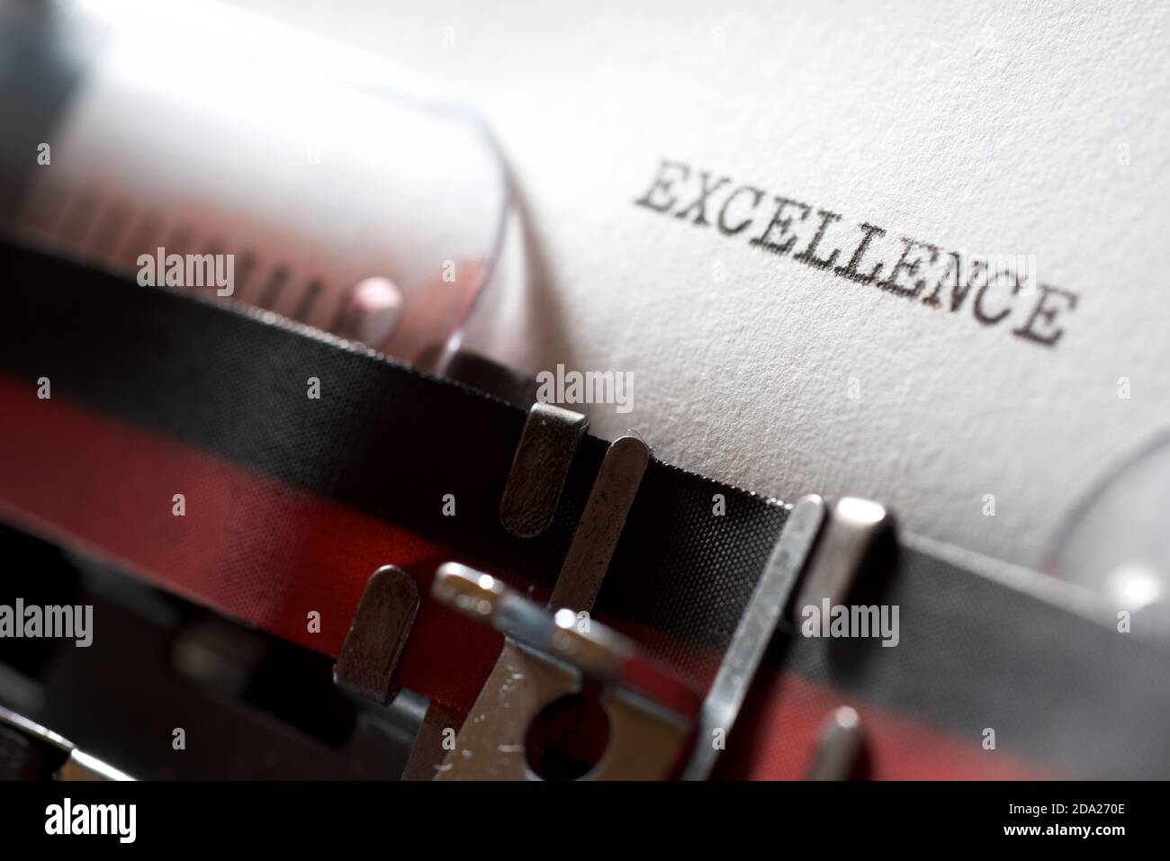 Excellence word written with a typewriter Stock Photo - Alamy