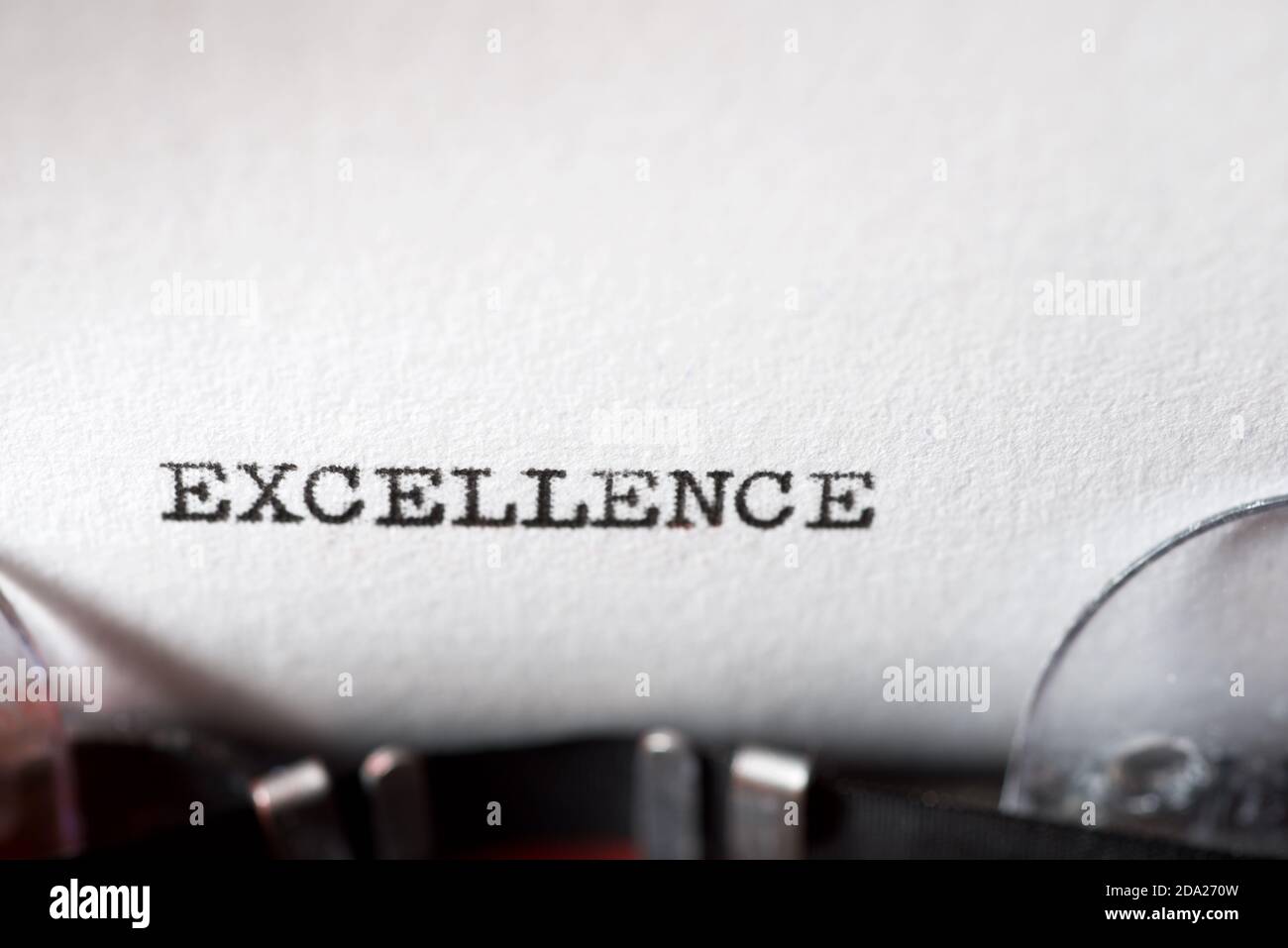 Excellence word written with a typewriter Stock Photo - Alamy